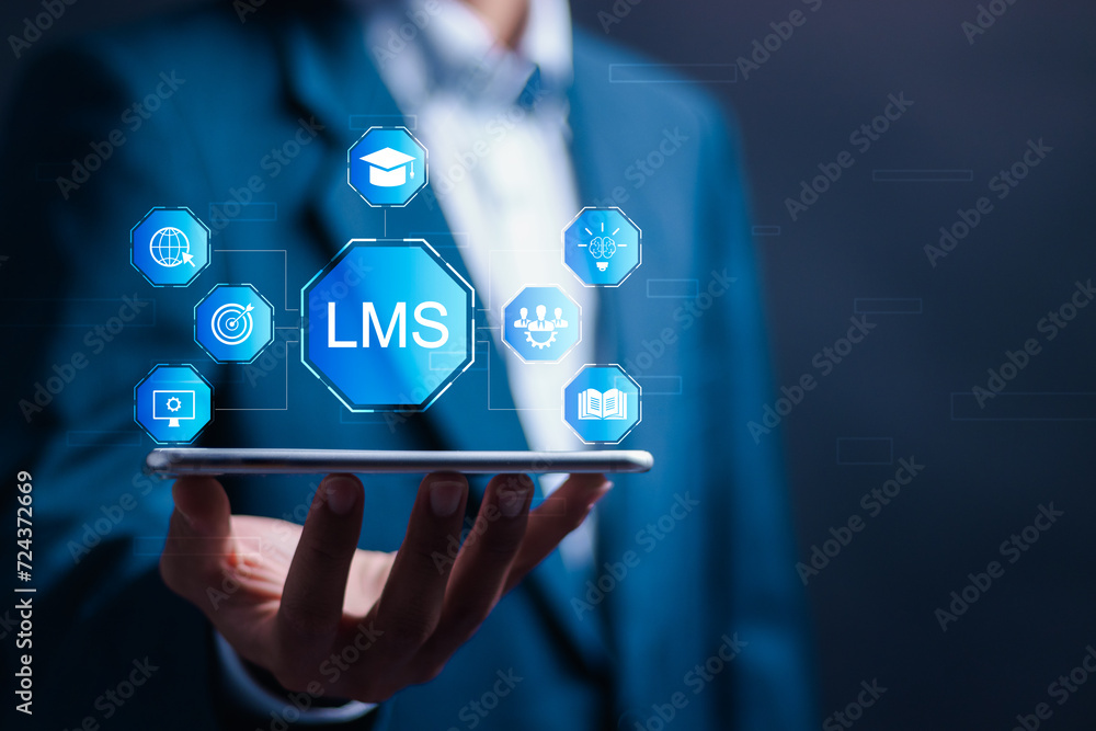 Learning management system concept. Businessman displays virtual screen ...