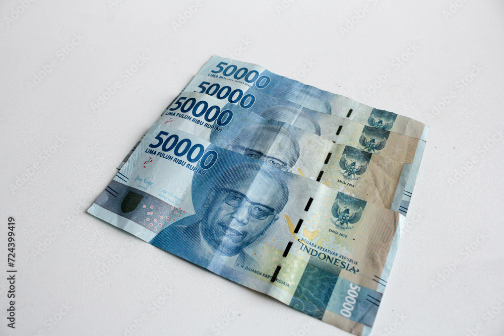 Cash payment concept. Indonesian rupiah currency (Rp. 50.000 Seratus ...