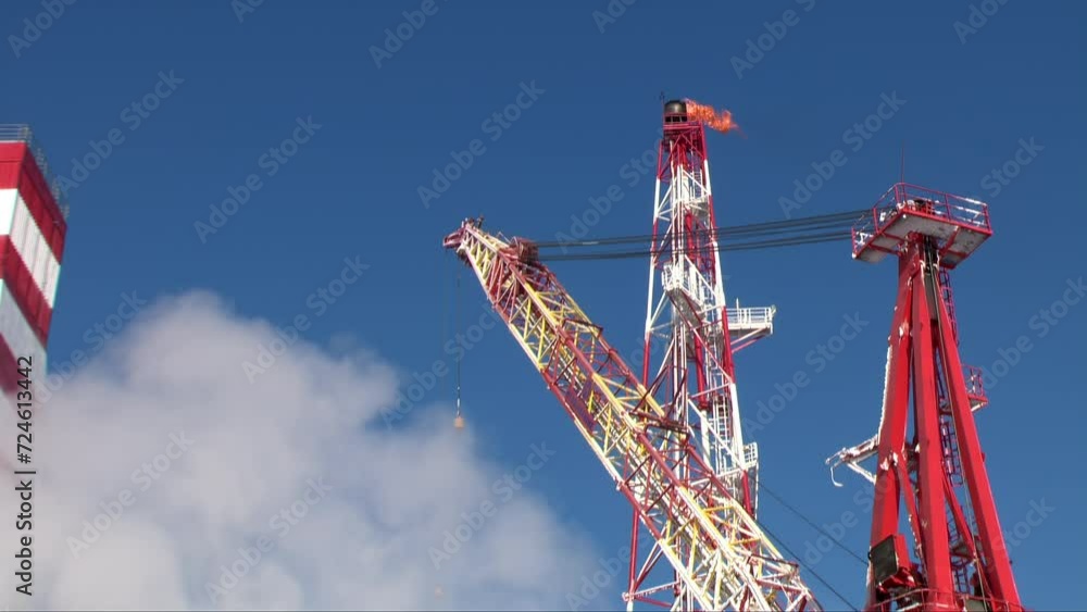 Camera collision with a flare on a gas release tower on an offshore oil ...