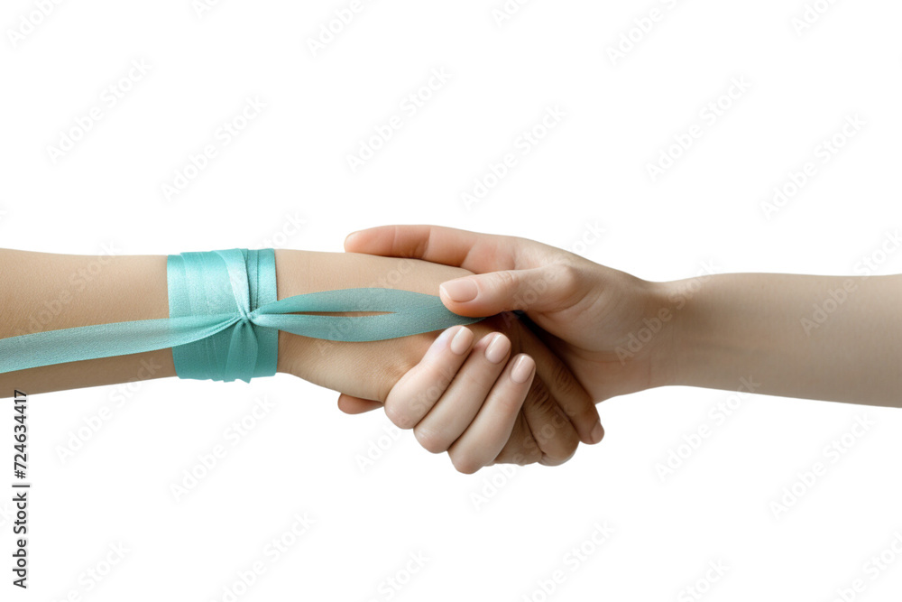 A touching scene of a caregiver tying an ovarian cancer ribbon around a ...