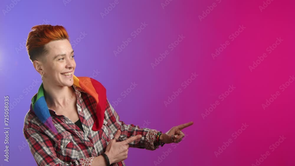 An enthusiastic LGBTQ rights defender gestures towards a blank space on ...