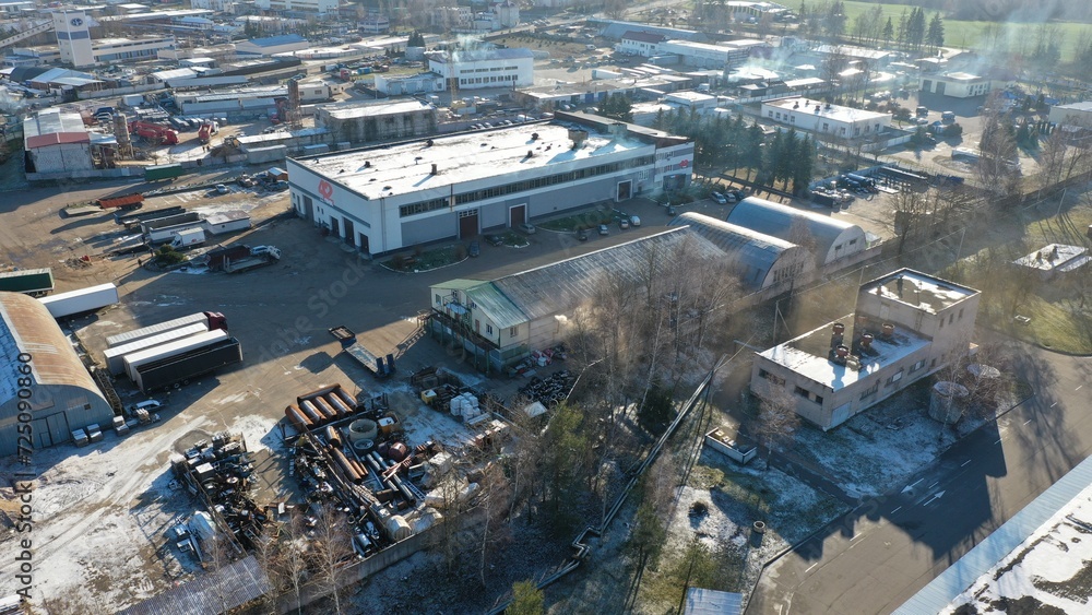 Industrial zone in winter, fall. Storage warehouses, logistics ...