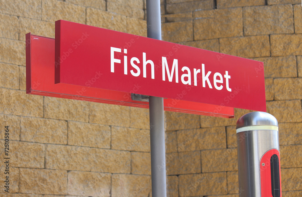 Orange Fish Market signage on a pole at the light rail station Stock ...