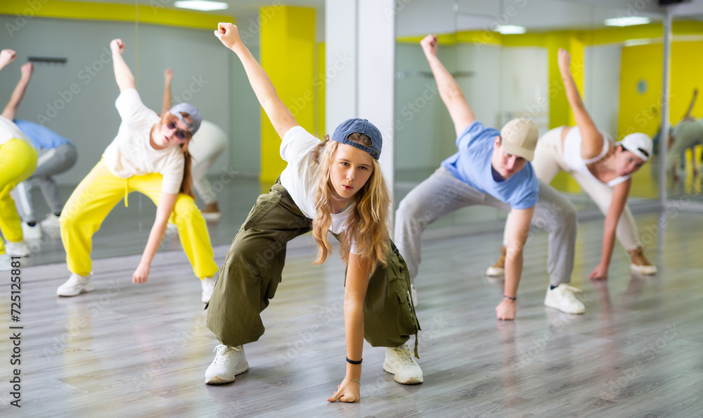Dancer boys and girls showing different tricks and movements while ...