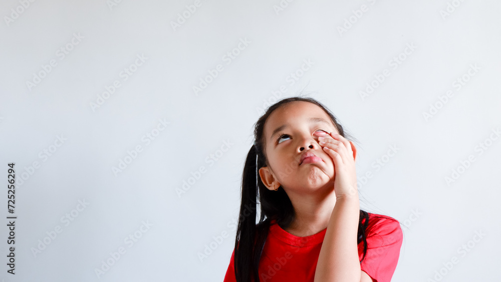 portrait of little asian girl tired, lethargic, strain, bored, bad mood ...