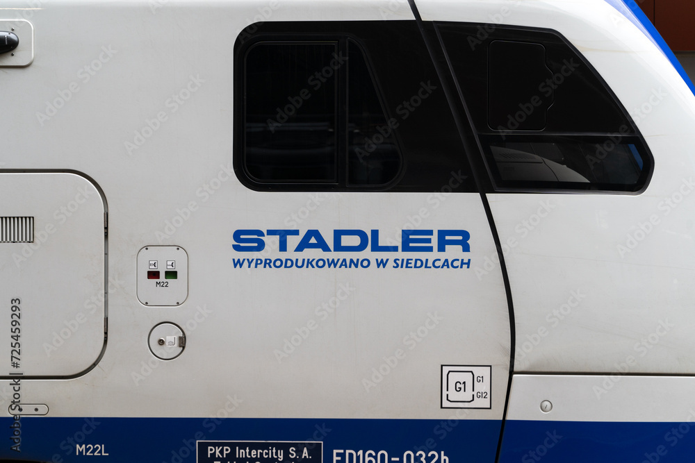 Stadler Rail logo sign on the train. Railway rolling stock manufacturer ...