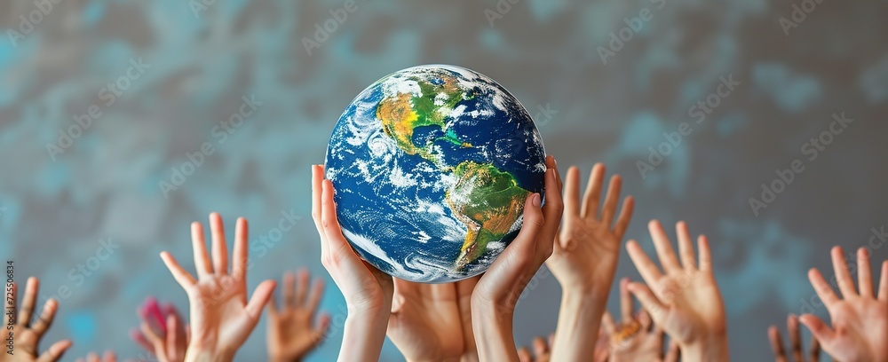 Multiple hands of different skin tones collectively support a vibrant ...