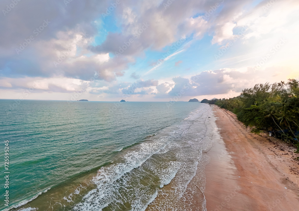 Beach with sky clouds top view. Top view of the beach by the sea with ...