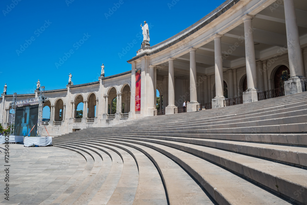 Perspective of amphitheater-shaped staircase and arcades with saints in ...