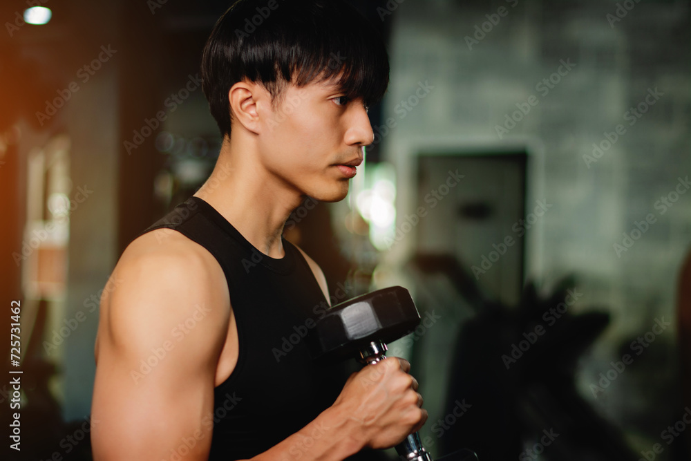 Lifting dumbbell exercises builds strong upper arm muscles. Exercise ...