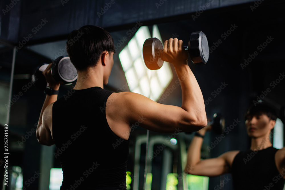 Lifting dumbbell exercises builds strong upper arm muscles. Exercise ...