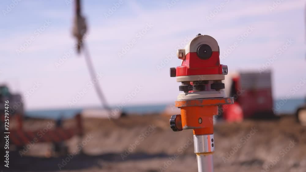 Close-up image of optical level or surveying instrument used to measure ...