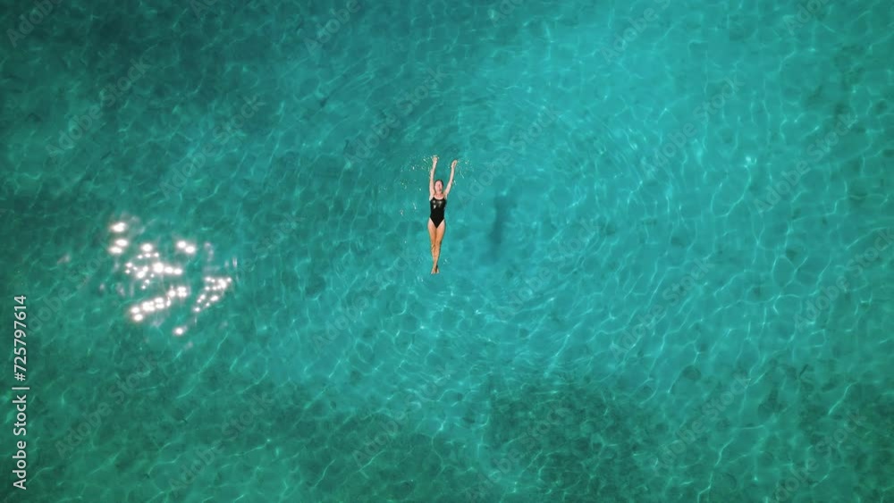 Vidéo Stock Peaceful Drifter in the Azure Depths of sea. A lone swimmer ...