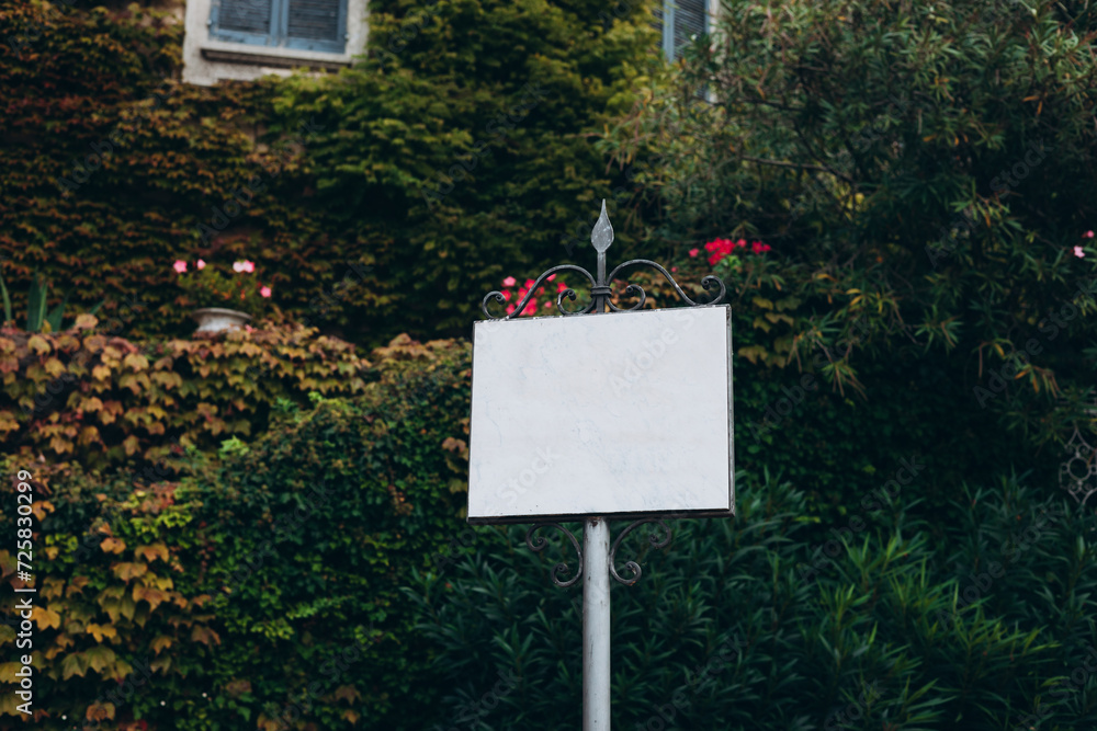 Information or advertisement white blank sign board mounted in urban ...