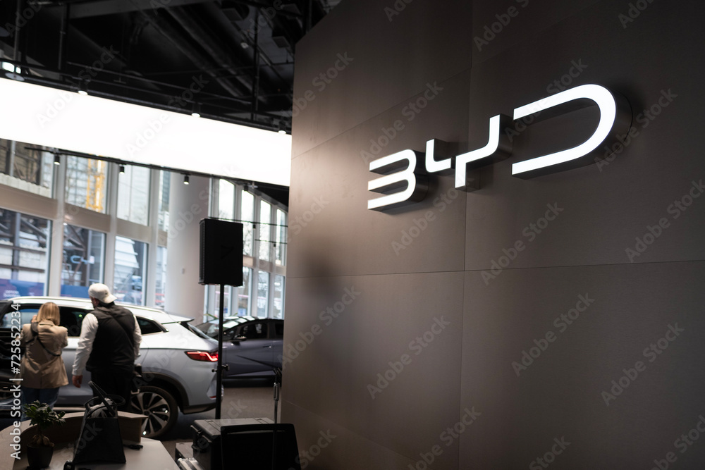 glowing Advertising banners BYD on black background, Chinese ...