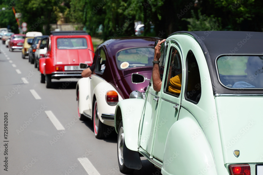 Traffic jam in the 1970s - retro cars on the road - Citroen 2CV, Dyane ...