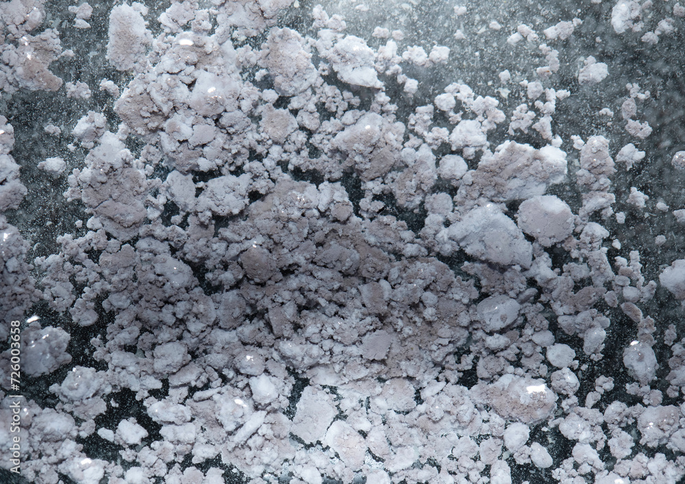 Silver chloride (AgCl) darkened from light, the product of the reaction ...