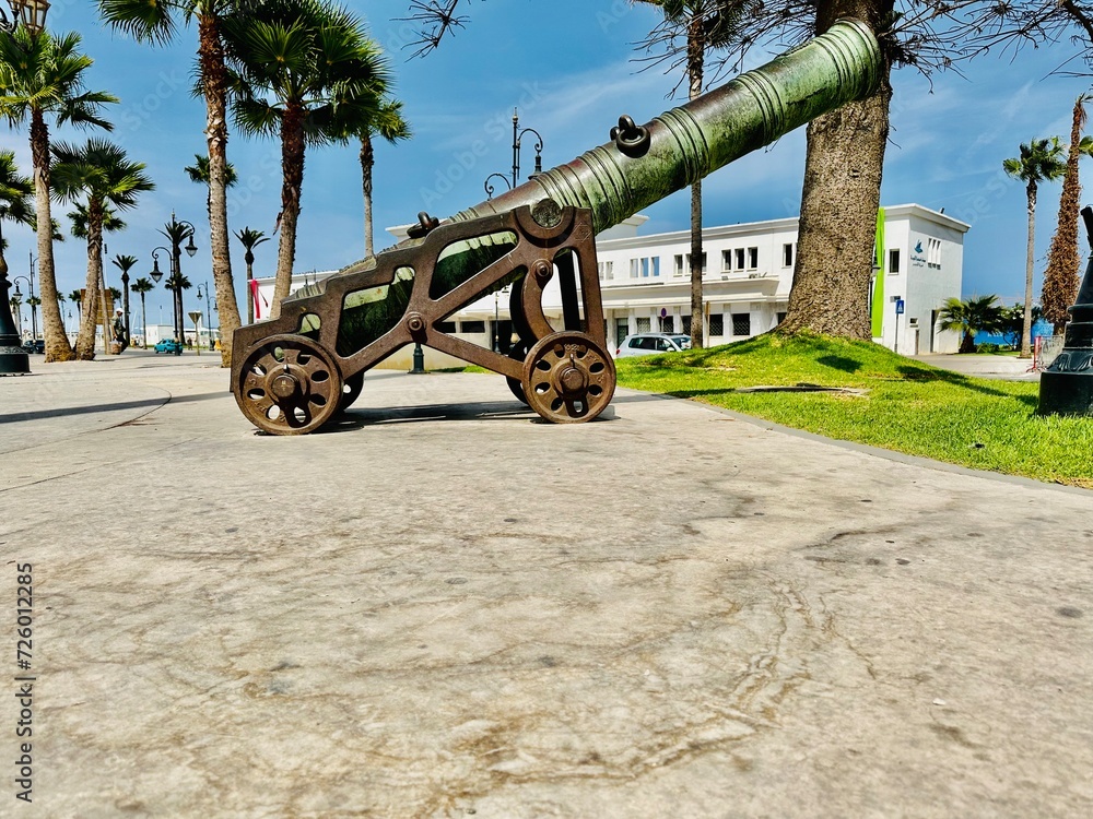 Ancient cannon heading to the sea. Old cannon on top of the Tangier ...