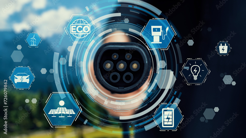 Focus EV charger pointing in front of camera display eco-friendly icon ...