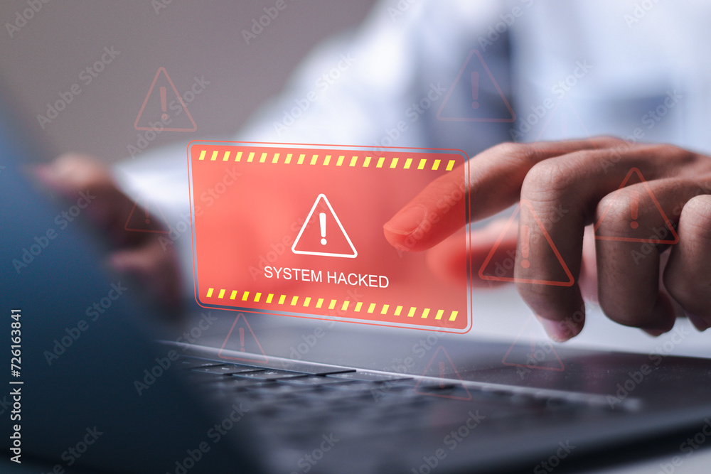 Ransomware malware attack and data breach. Businessman use laptop with ...