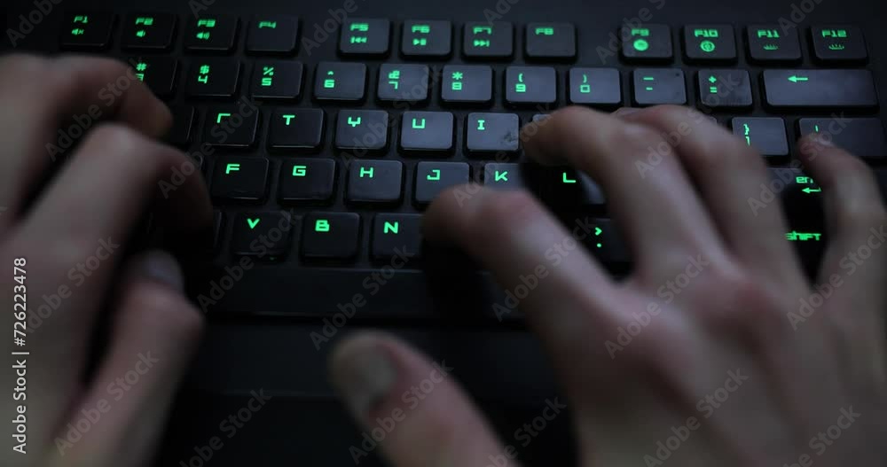 Vidéo Stock Typing with hands on mechanical keyboard green light ...