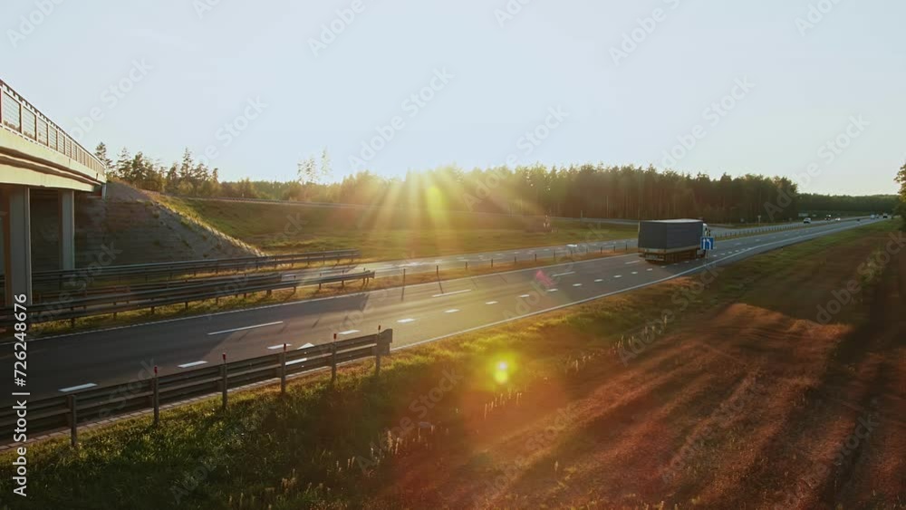 A-frame drawbar full trailer truck with curtain side driving on highway ...