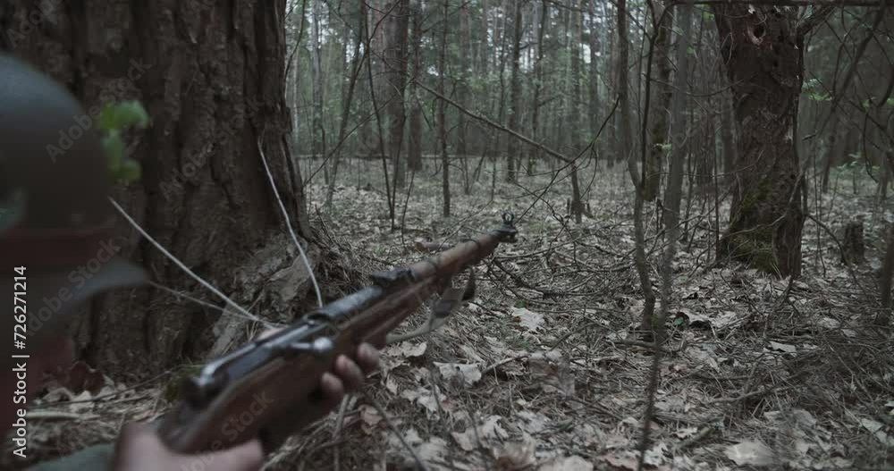 Reenactor Dressed As German Infantry Soldier Shoot From Rifle Carabine ...