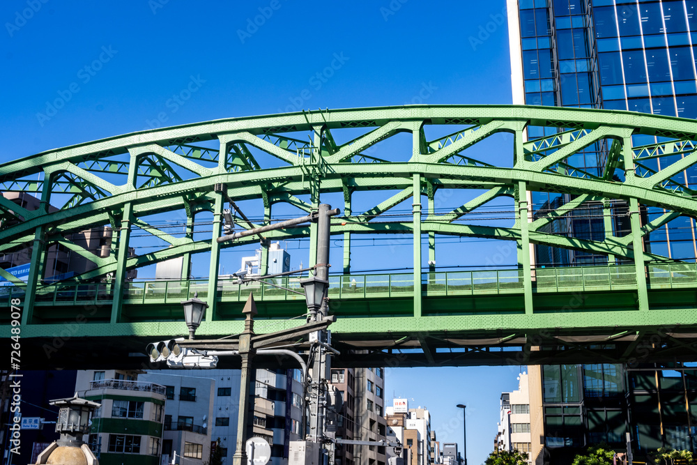 Tokyo, Japan, 26 October 2023: Pedestrian Overpass with Green Framework ...