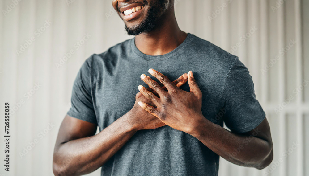 hand over chest, depicting heart attack pain, against a clean ...