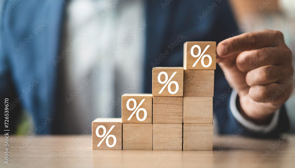 rising percentage signs in blocks, symbolizing inflation and economic ...