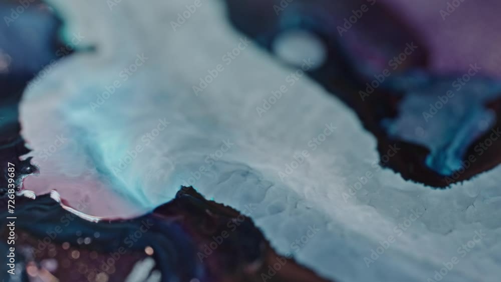Vidéo Stock Abstract swirls of blue and white ink diffusing in water ...