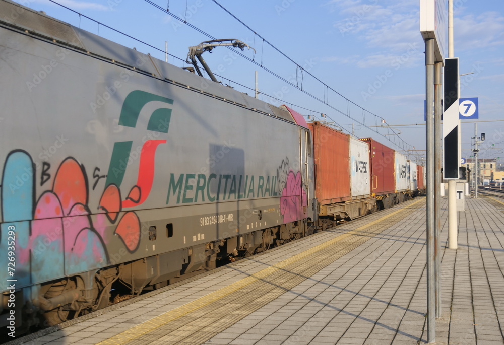 Freight train in transit at Treviglio central station on the Milan ...