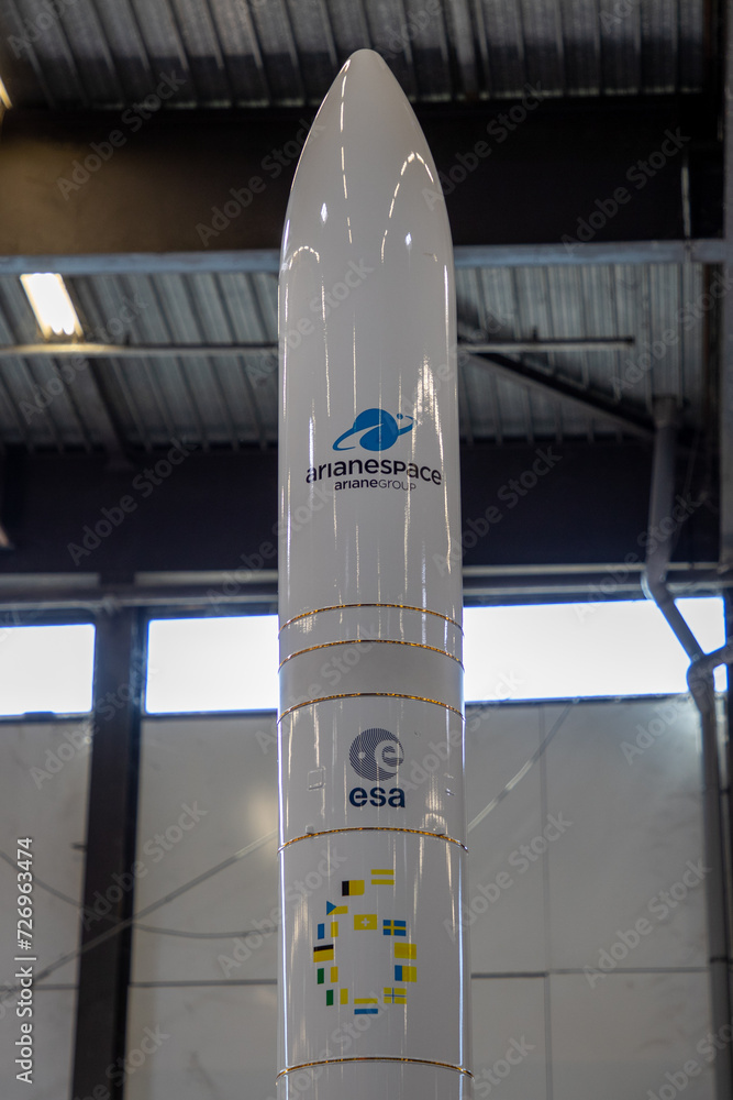 arianespace esa by arianegroup logo brand and text sign on Ariane 6 heavy launch vehicle scale ...