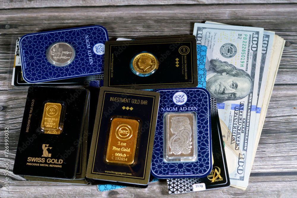 Cairo, Egypt, January 29 2024: American dollars bills, BTC, Sam, Swiss ...