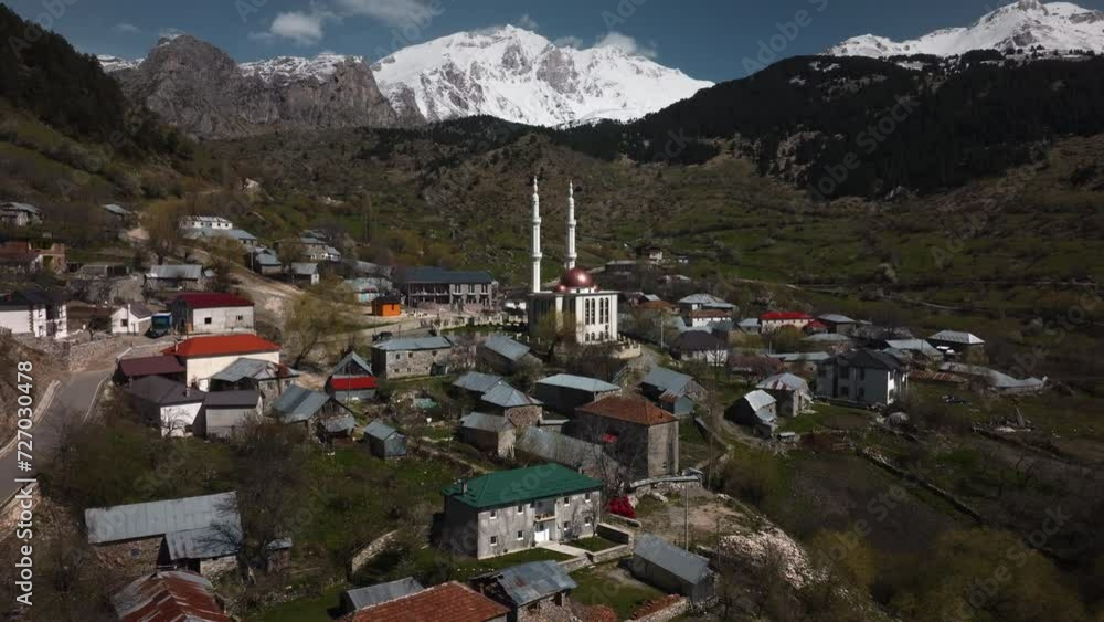 Muslim Mosque of Radomirë Albania, aerial view of a village with ...