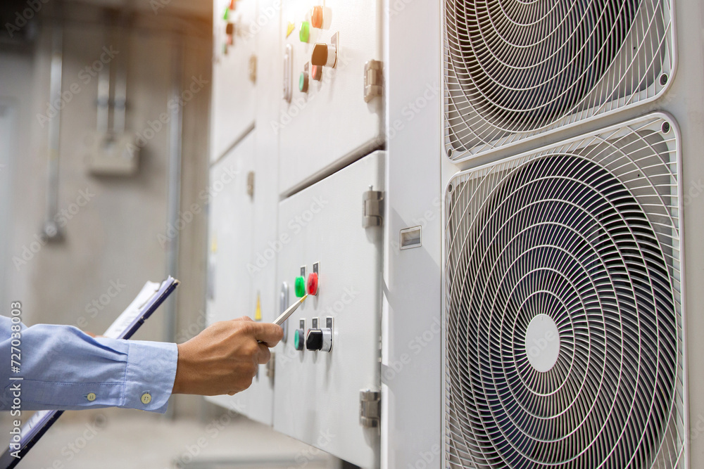 Electrical engineer checking electric at circuit breaker of air ...