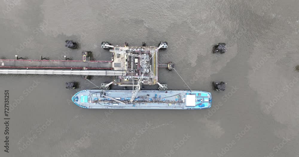 Top down view on landing port for bulk carrier ships. Oil tanking ...