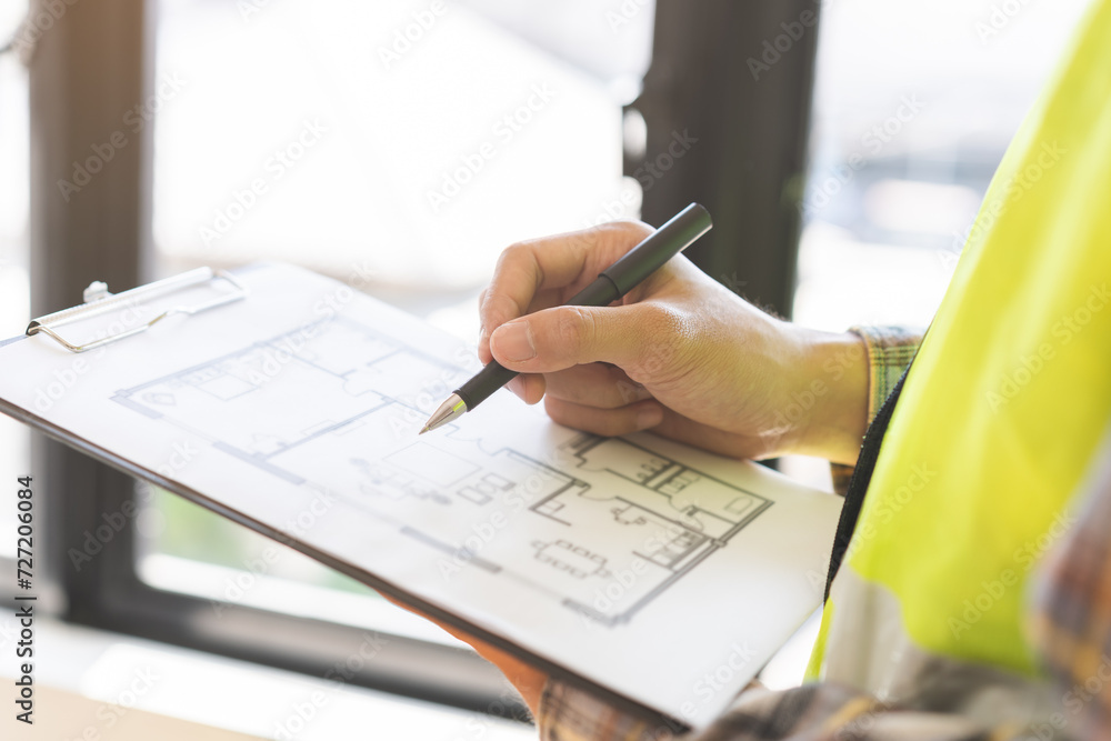 Building inspection asian contractor young man, male inspecting home ...