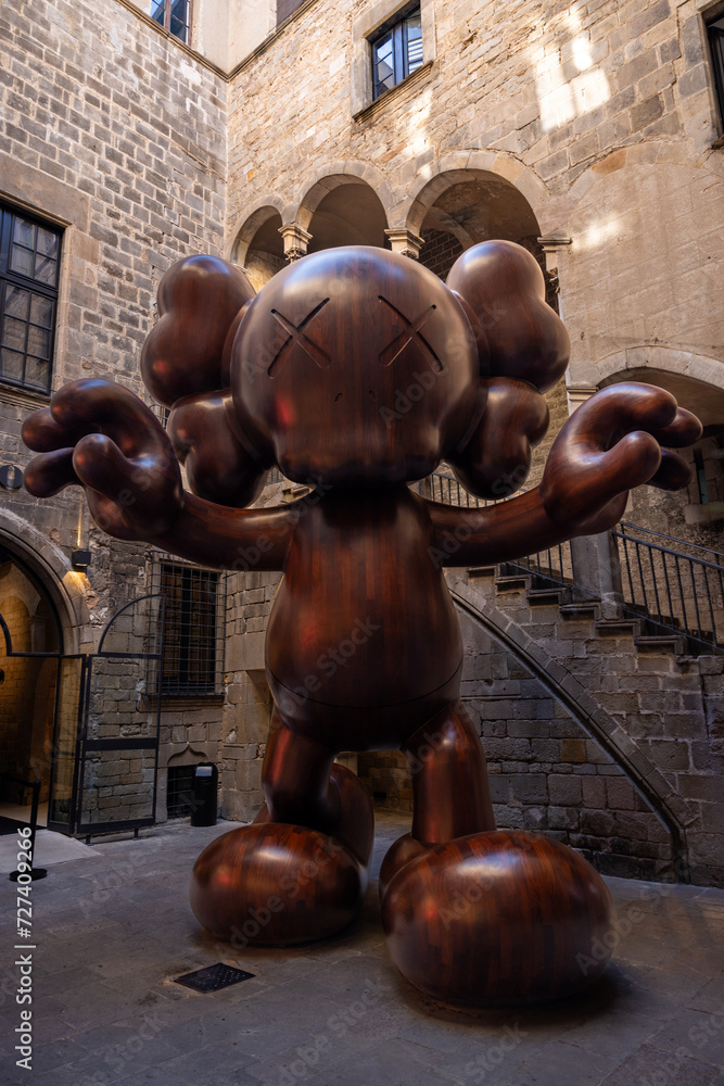 Barcelona, Spain - April 11 2023 : A wooden companion statue by world famous contemporary modern ...