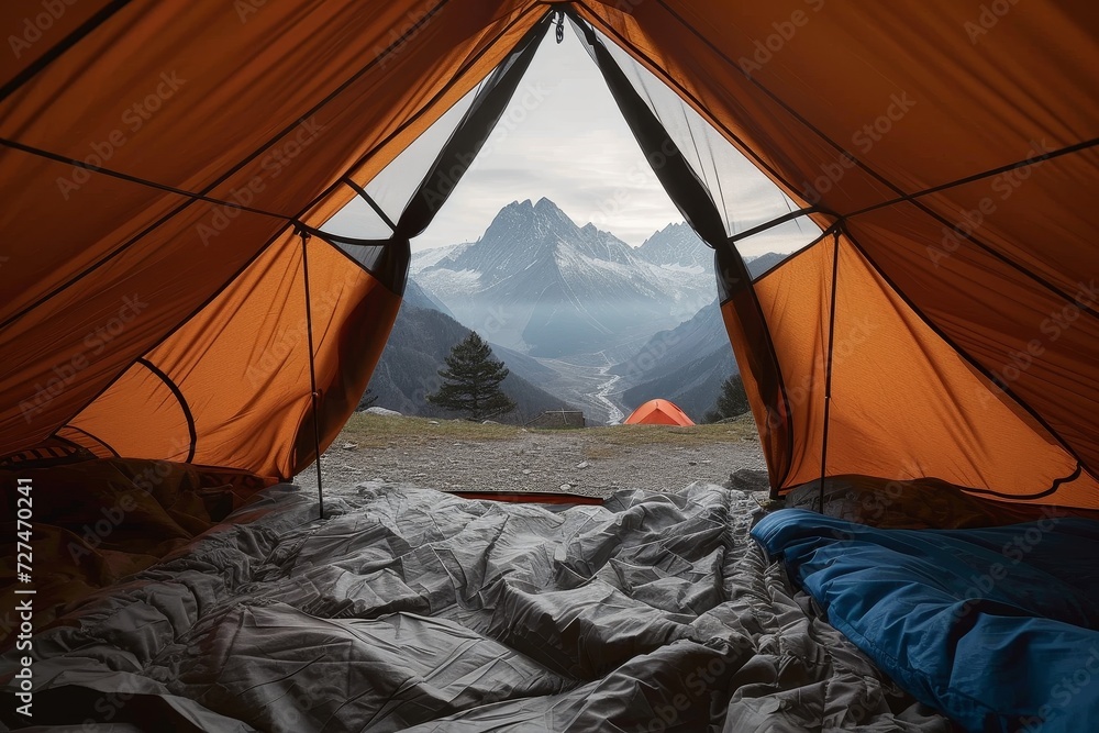 Amidst the wilderness, a sturdy tent stands with a tarpaulin roof ...