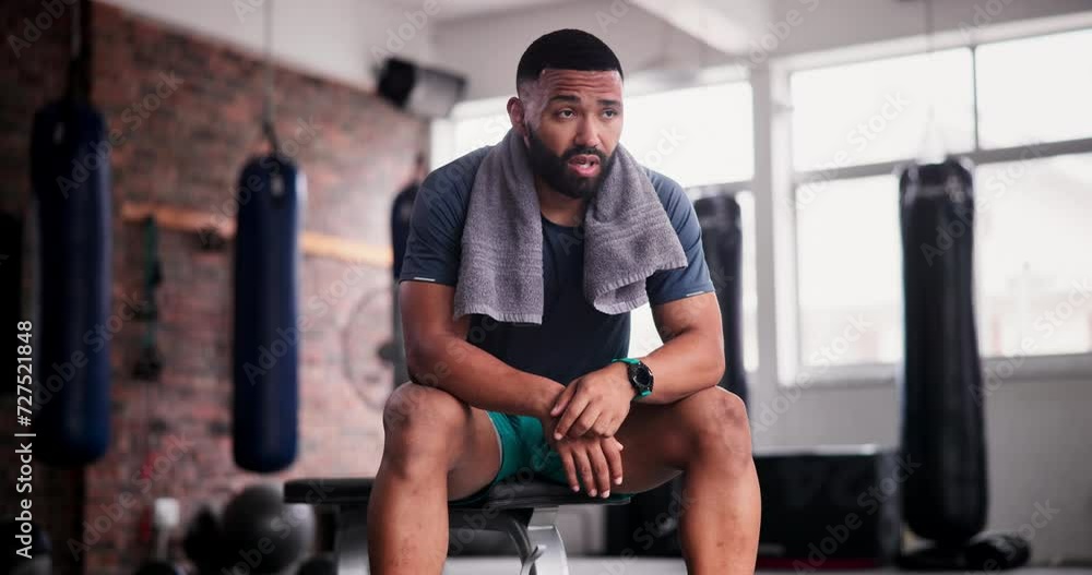 Vidéo Stock Gym, break and tired man with towel, pause or breathing for recovery from intense ...
