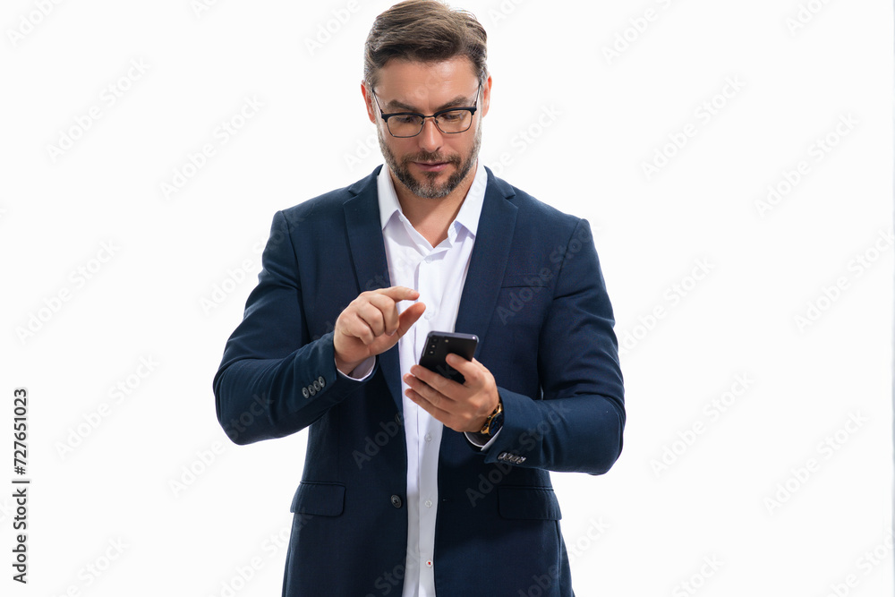 Business man in business suit using smart phone. Portrait attractive ...