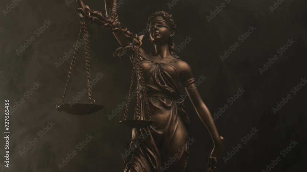 blindfolded bronze statue goddess of justice holding a scale for ...