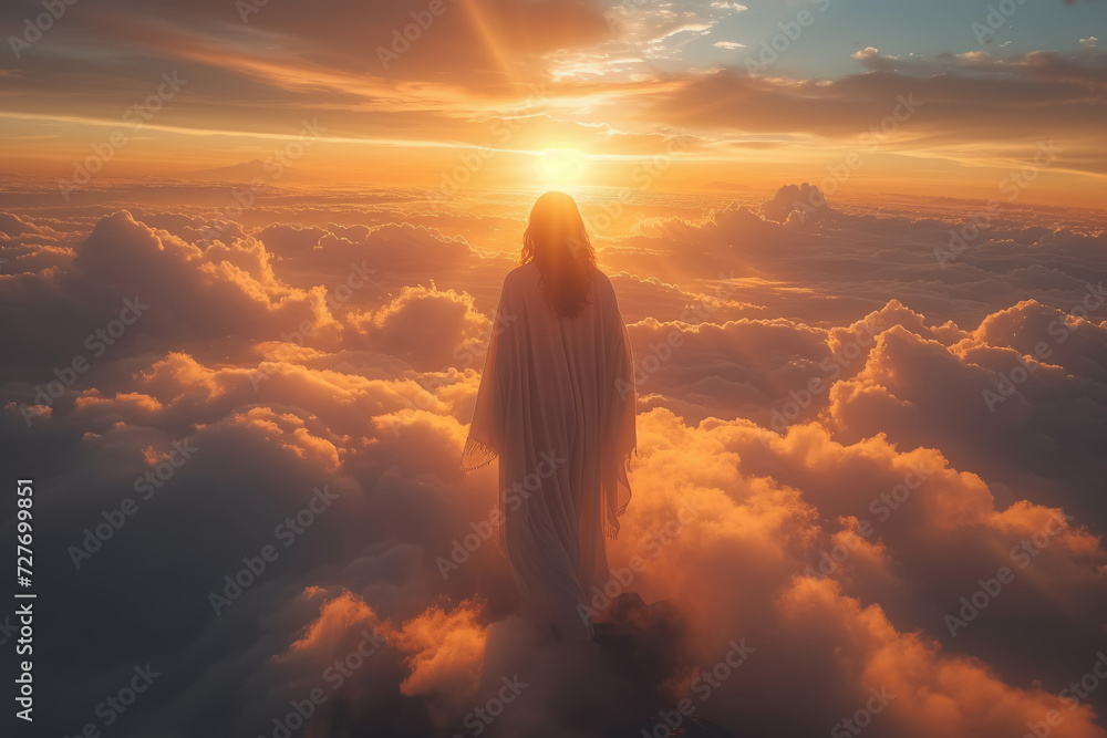Back view of Jesus christ ascending to heaven above the bright light ...