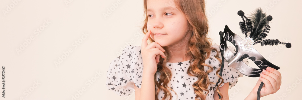 Child in a carnival masquerade mask. Festival, carnival, party. A ...