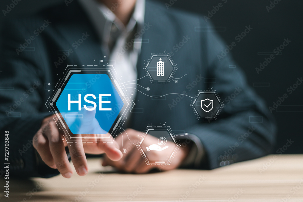 HSE, Health safety environment concept. Businessman touch virtual HSE ...