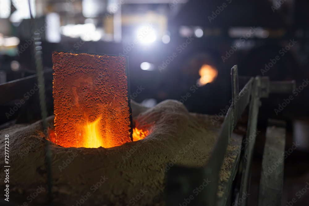 Foundry - ferrous metal is melted in an induction furnace of ...