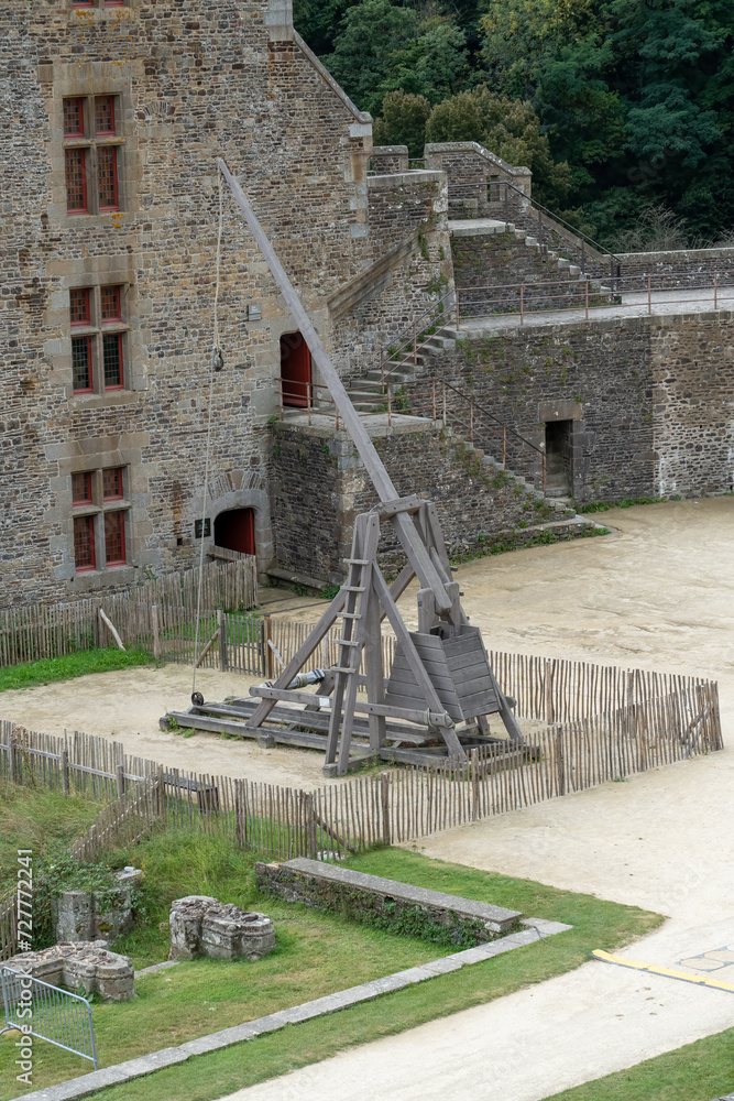 Medieval Trebuchet on a Wooden Palisade in an aged medieval castle, the ...