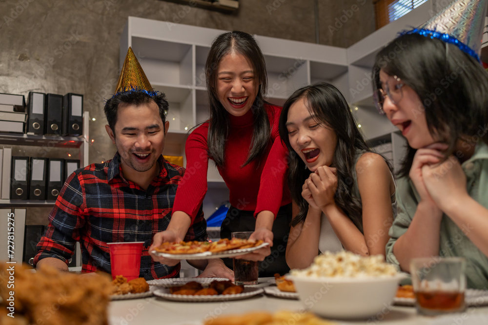 Happy diverse team people talking laughing eating pizza in office ...