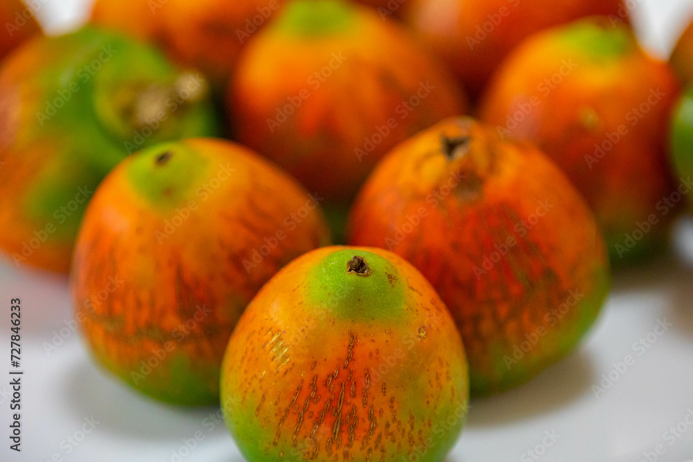 Rare and exotic fruit of the peach palm (Bactris gasipaes), typical ...
